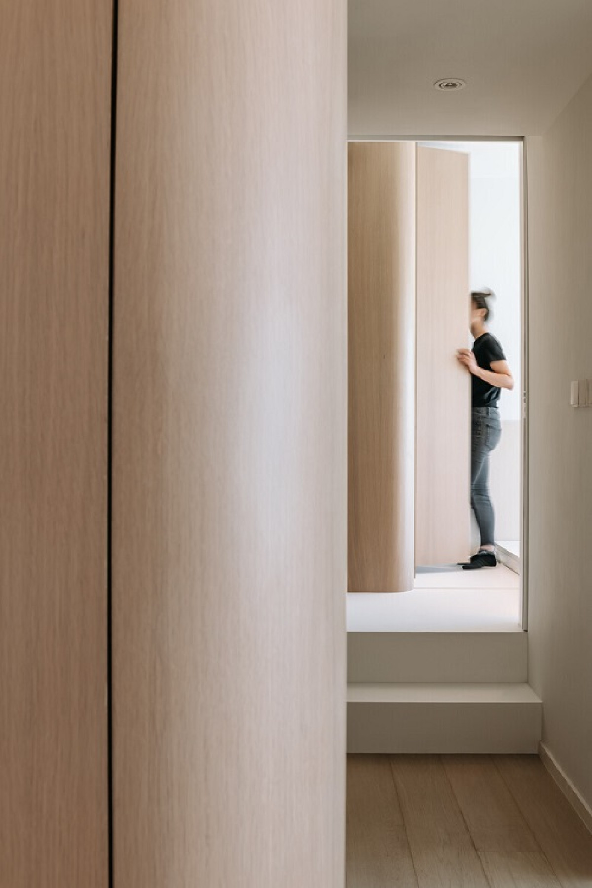 Undulating compact home in Hong Kong defines spatial harmony and provides ingenious storage ...